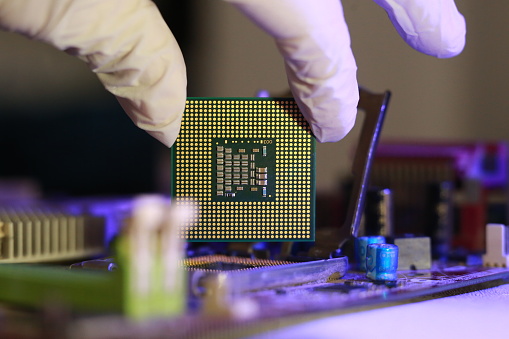 Technician Installing Cpu Chip Microprocessor Socket On Motherboard ... Technician Installing Cpu Chip Microprocessor Socket On Motherboard ...