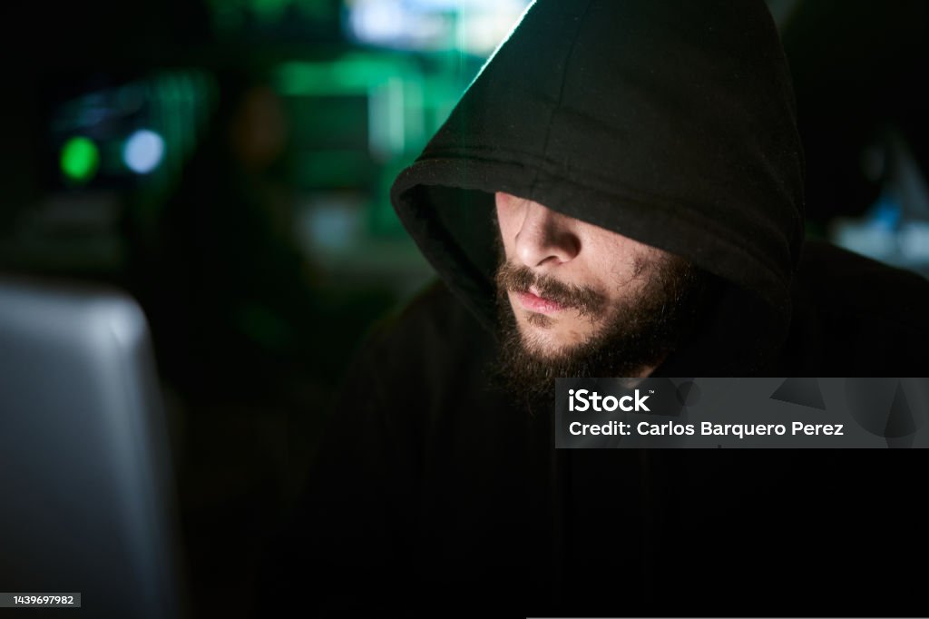 Criminal Team Hacker Using Computer For Organizing Massive Data Breach