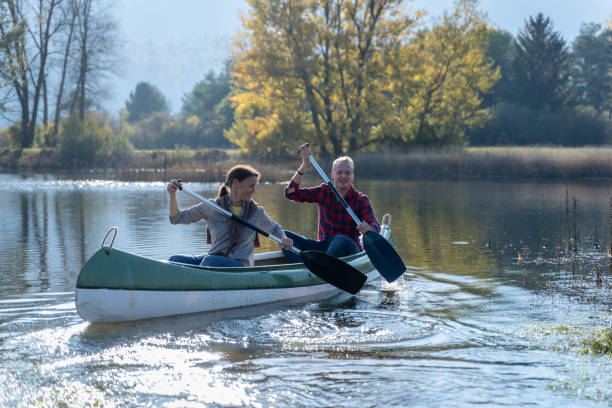Free Stock Photo of Two People Canoeing on a Lake | Download Free ...