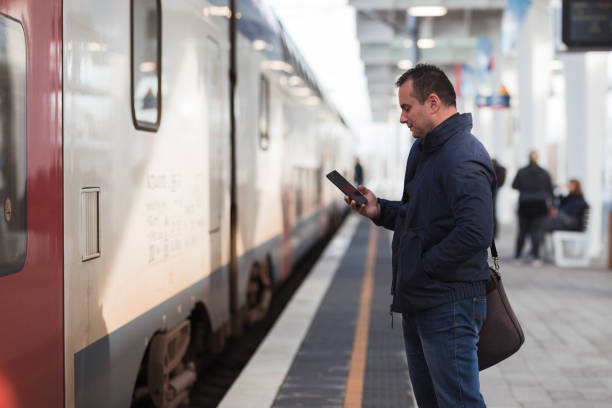 Free Stock Photo of Man Standing on Platform Next to Train | Download ...