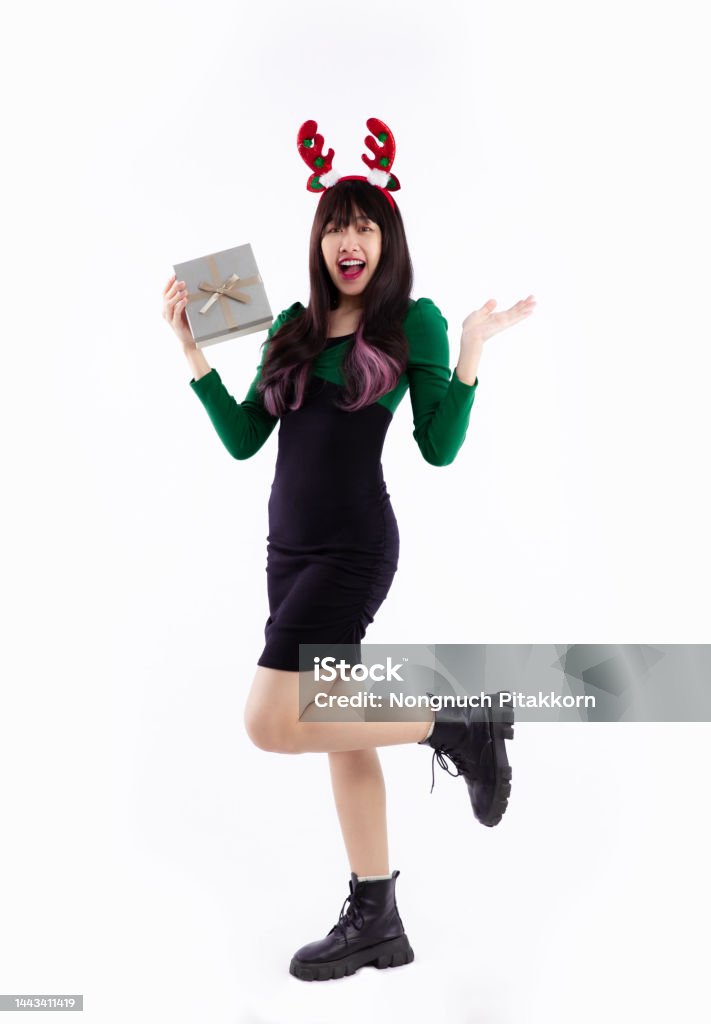 Young Asian Woman Long Hair Style In Green And Black Dress Wearing