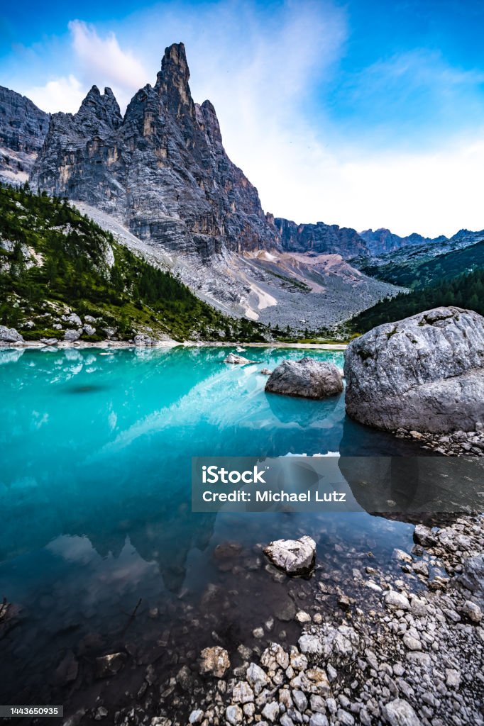 Beautiful Reflections On Turquoise Sorapis Lake And With Dito Di Dio In