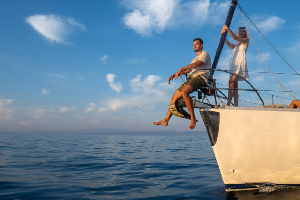 Free Stock Photo of Couple Standing on Boat in Ocean | Download Free ...