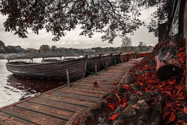 Free picture: Dark red wooden boats on channel riverbank in spring time