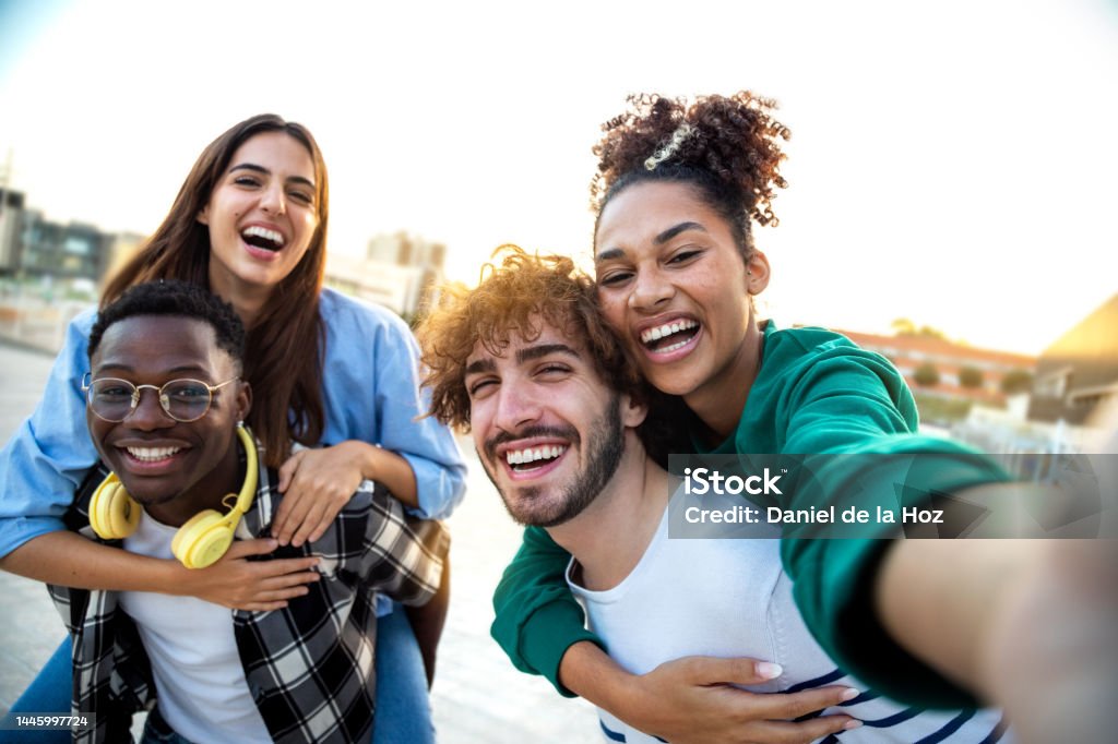 Multiracial Happy Friends Having Fun Taking Group Selfie Portrait On