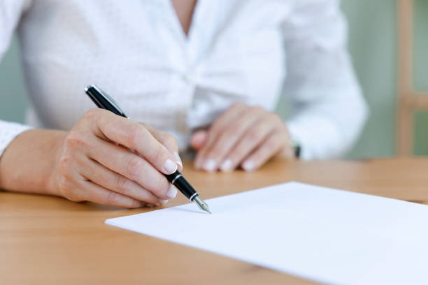 Free Stock Photo of Close-up of hand signing document with fountain pen ...
