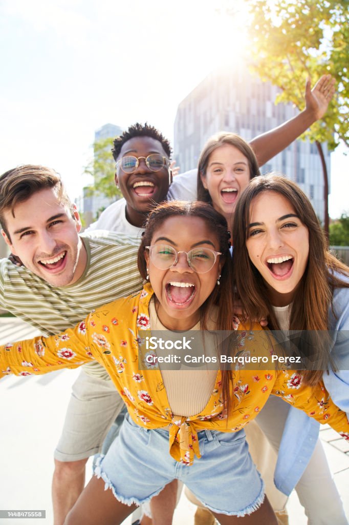 Happy Young Friends Looking Camera And Laughing Smiling Group Of People ... Happy Young Friends Looking Camera And Laughing Smiling Group Of People ...