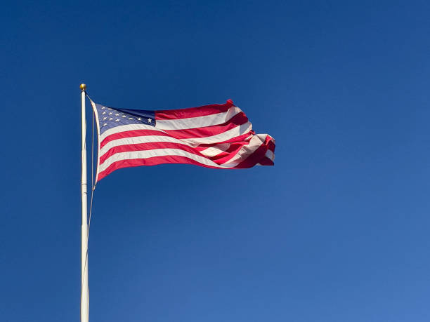 Free Stock Photo of American flag waving against blue sky | Download ...