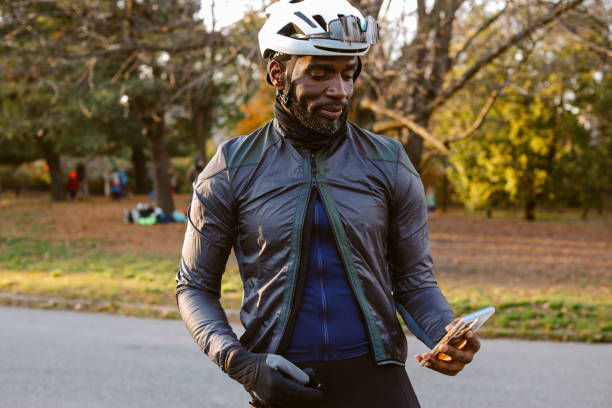 Cycling Enthusiast Checks Bike with Laptop @Jayson1 | Black & Brown ...
