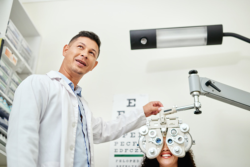 Eye Exam Doctor And Healthcare Vision Test Of A Consulting Man