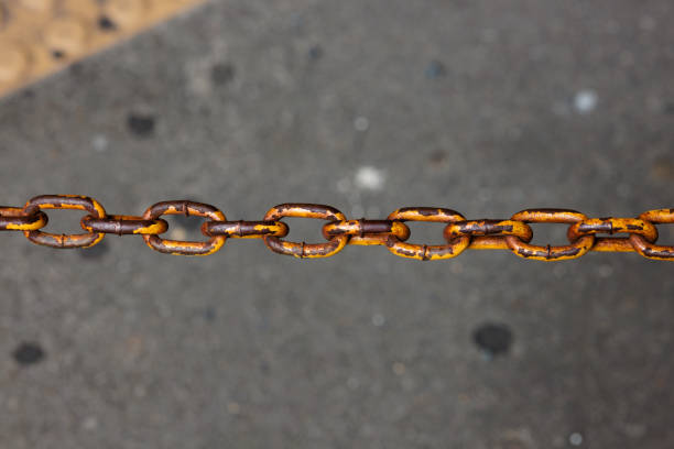 Free Stock Photo of Close-up of rusted metal chain links against a ...