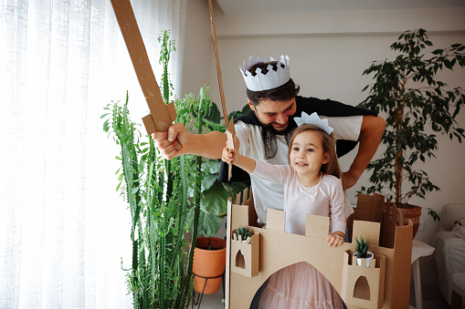 Father Playing Exciting Adventure Game With Daughter Stock Photo ... Father Playing Exciting Adventure Game With Daughter Stock Photo ...