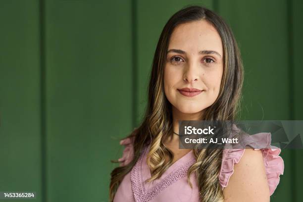 Confident Architect Smiling While Standing By A Green Wall Stock Photo ... Confident Architect Smiling While Standing By A Green Wall Stock Photo ...