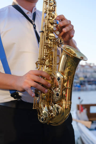 Free Stock Photo of Close Up of a Saxophone on Blue Background ...
