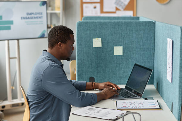 Man Bored In Cubicle