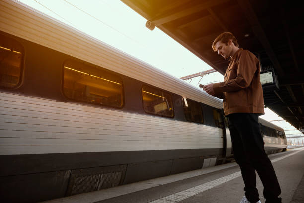 Free Stock Photo of Man Standing on Platform Next to Train | Download ...