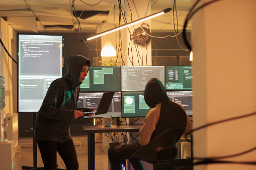 Hackers Coding Spyware Cracking Database Password Data Breach Stock