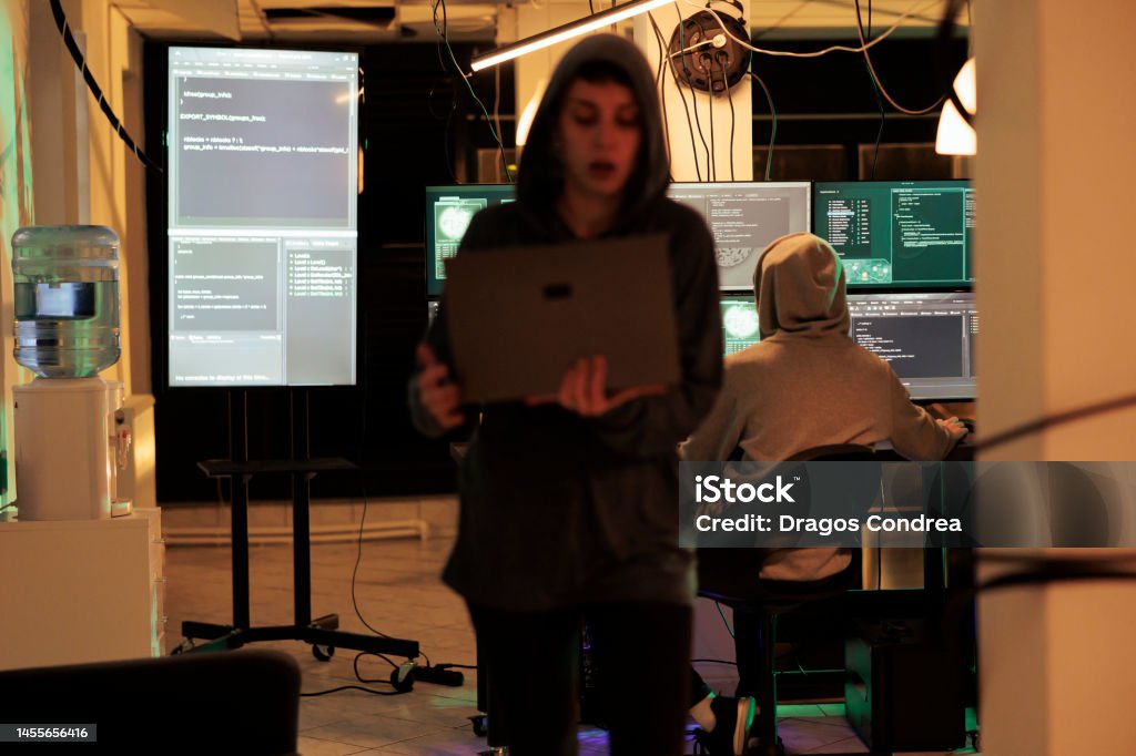 Hackers Team Using Computers To Plant Virus And Hack Network System