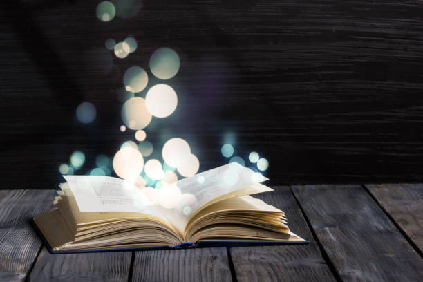 Free Stock Photo of An open book with lights in the background ...