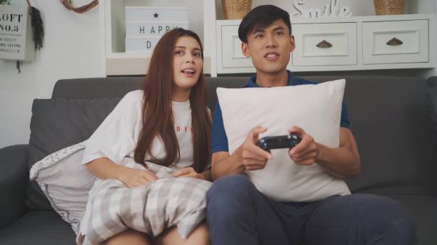 Free Stock Photo of Two People Playing a Video Game in Front of a TV ...