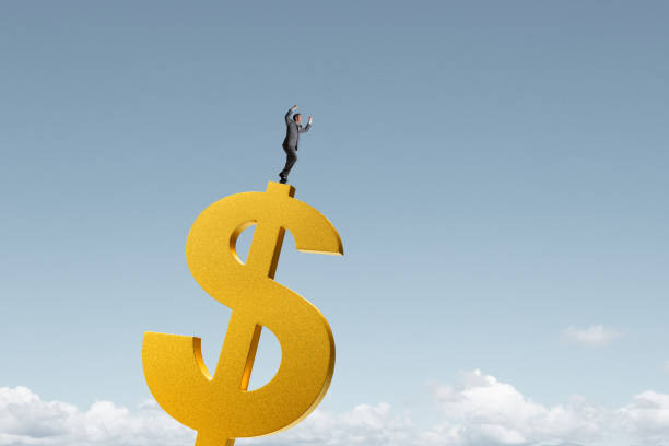 Free Stock Photo of Person holding a large golden dollar sign ...