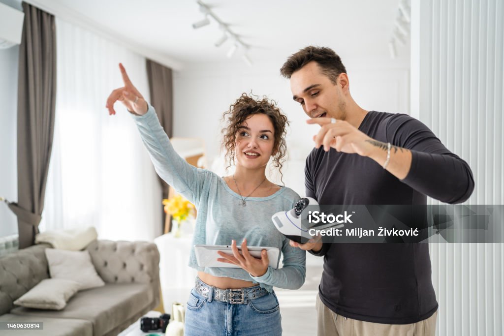 Man And Woman Couple Wife Husband Set Up Surveillance Security Camera