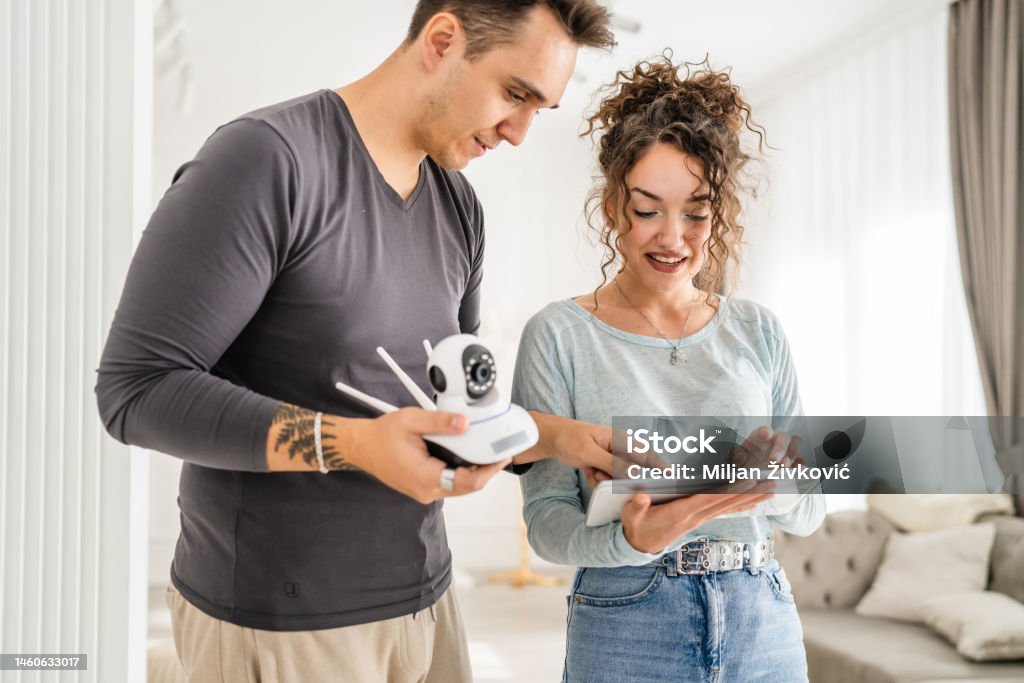 Man And Woman Couple Wife Husband Set Up Surveillance Security Camera