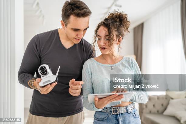 Man And Woman Couple Wife Husband Set Up Surveillance Security Camera