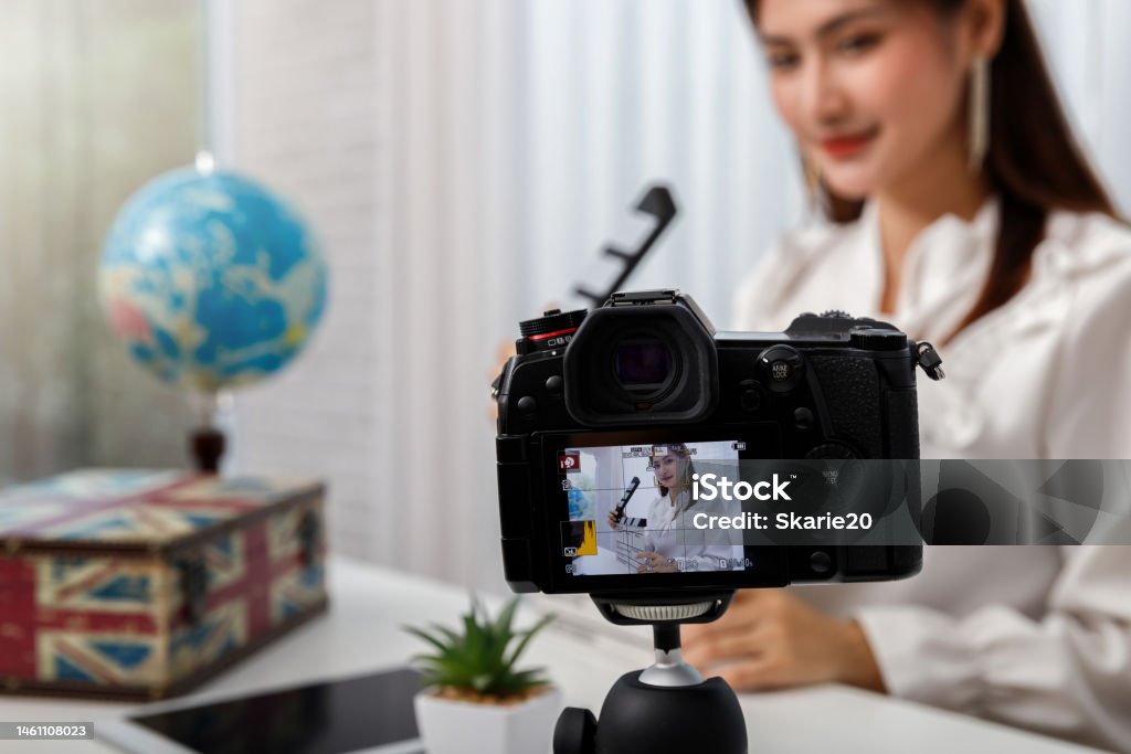 Young Asian Woman Traveler Blogger Selfie Herself With Smart Phone