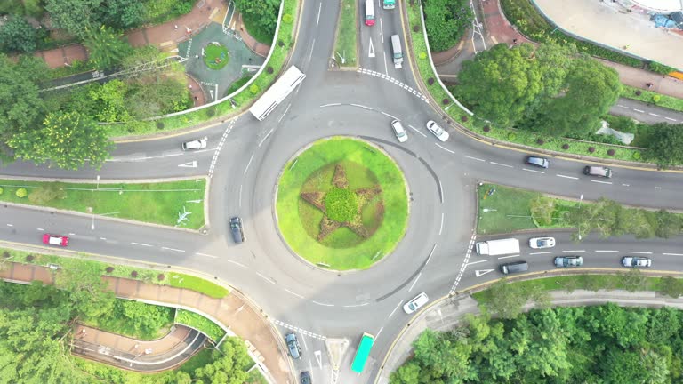 Aerial Top Down Orbiting, Rotating Drone View Of Traffic Circle ... Aerial Top Down Orbiting, Rotating Drone View Of Traffic Circle ...