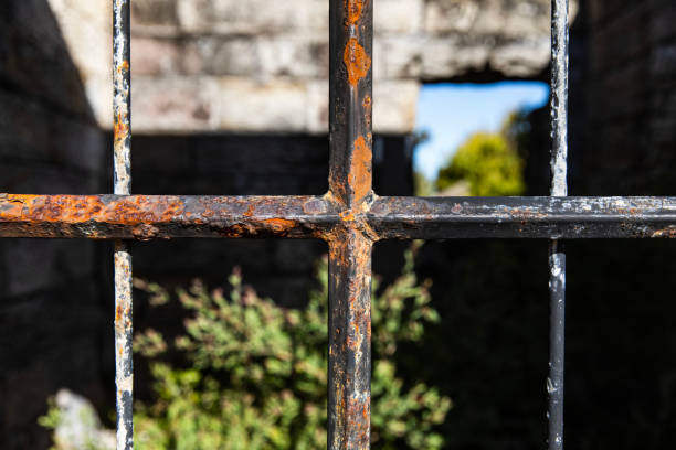 Free Stock Photo of Abandoned Rusted Building With Window and Bars ...