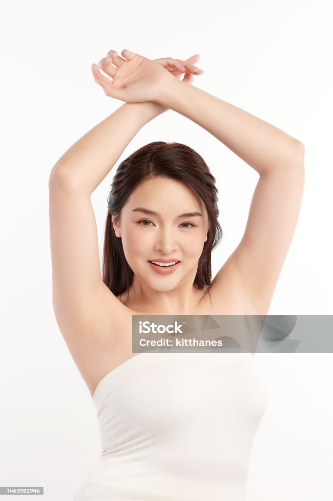 Beautiful Young Asian Woman Lifting Hands Up To Show Off Clean And