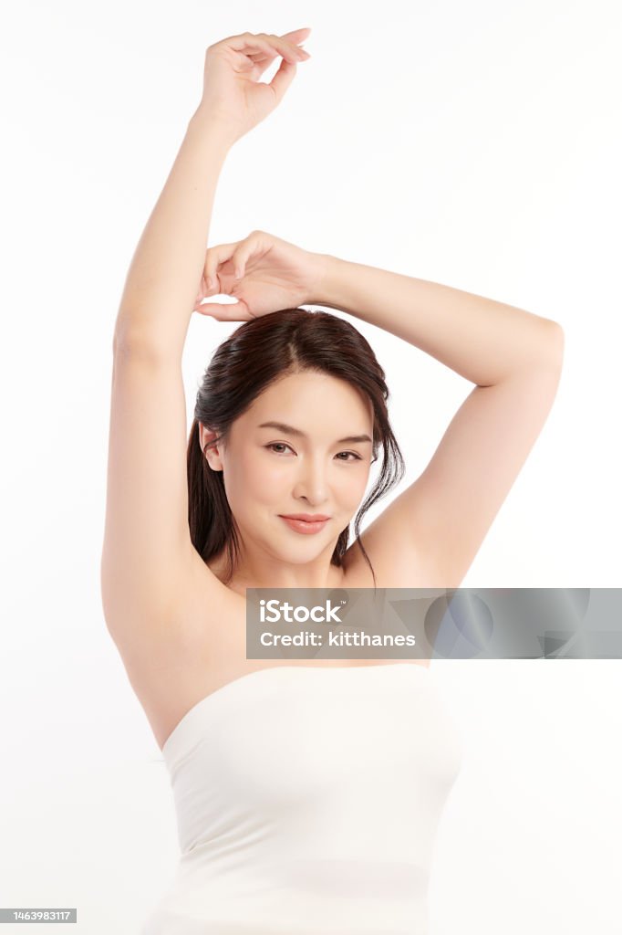 Beautiful Young Asian Woman Lifting Hands Up To Show Off Clean And