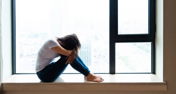 Free Stock Photo of Sad Woman sitting near window | Download Free ...