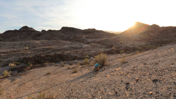 Free Stock Photo of Mountain Bikers Riding Through the Desert ...
