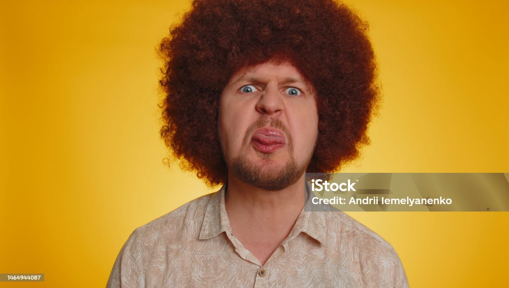 Funny Joyful Man Making Playful Silly Facial Expressions Grimacing