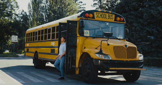Free Stock Photo of Man Standing in Front of Yellow School Bus ...