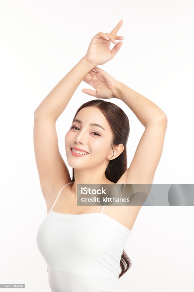 Beautiful Young Asian Woman Lifting Hands Up To Show Off Clean And