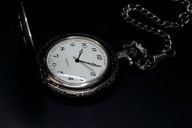 Free picture: Old-fashioned silver analog pocket watch and flowers on a ...