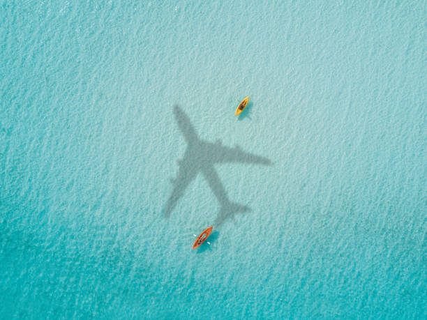 Free Stock Photo of Airplane Flying Over Ocean With Rainbow in Sky ...