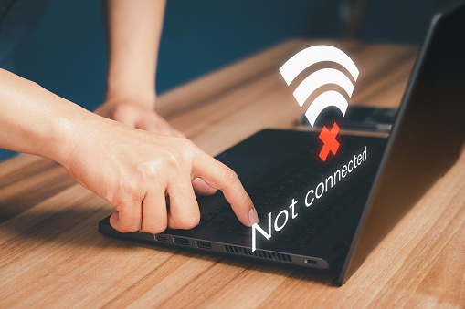 Man Using A Computer Laptop To Connect To Wifi But Wifi Not Connected