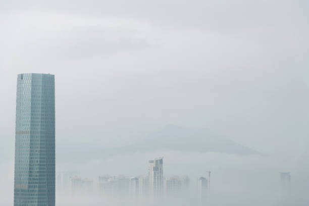 Free Stock Photo of Tall Building Amidst Foggy Sky | Download Free ...