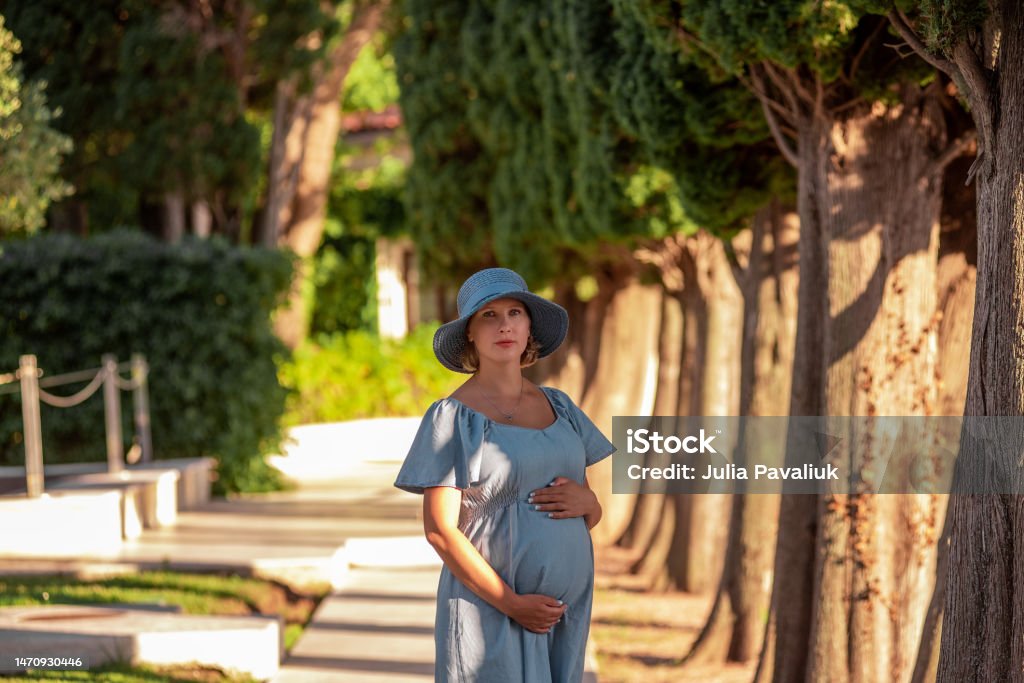 Close Up Portrait Middle Aged Pregnant Woman In Pine Forest Concept Of