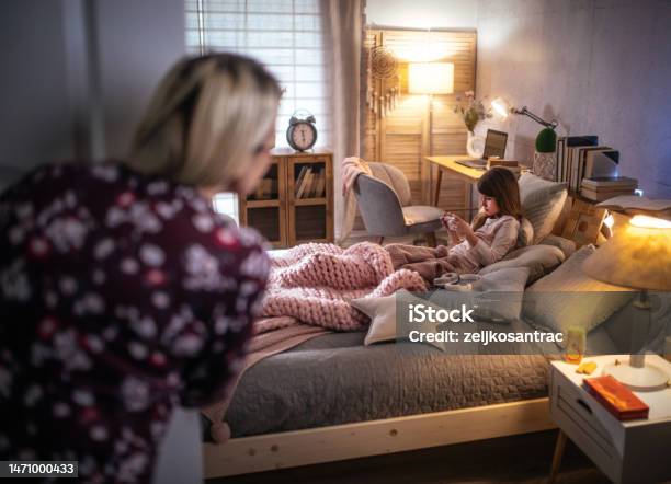 Mom Spying On Her Daughter While She Is Using The Phone In Bedroom