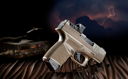 Lightning Striking Behind A Handgun And Cb Radio Stock Photo - Download ... Lightning Striking Behind A Handgun And Cb Radio Stock Photo - Download ...