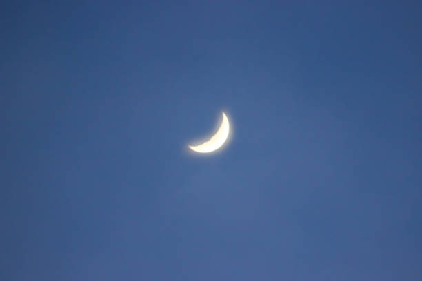Free Stock Photo of Crescent moon in a clear night sky with visible ...
