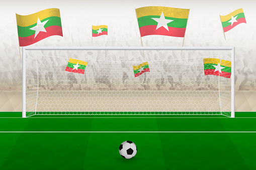Penggemar Tim Sepak Bola Myanmar Dengan Bendera Myanmar Bersorak Di ... Penggemar Tim Sepak Bola Myanmar Dengan Bendera Myanmar Bersorak Di ...
