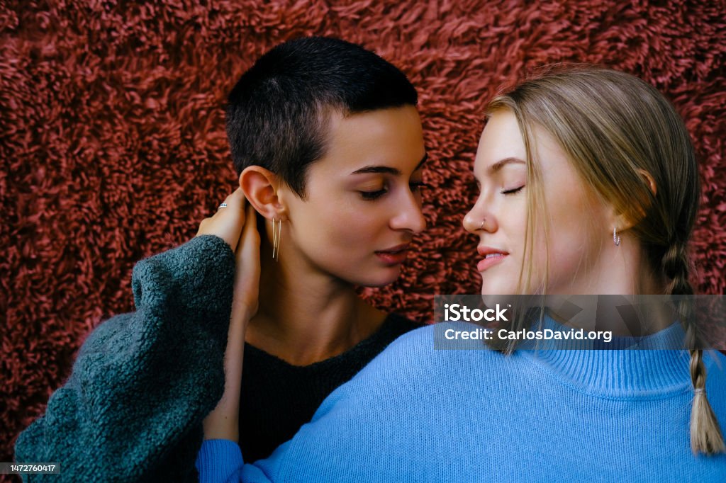 Affectionate Lesbian Couple Face To Face With Eyes Closed Radiant Love