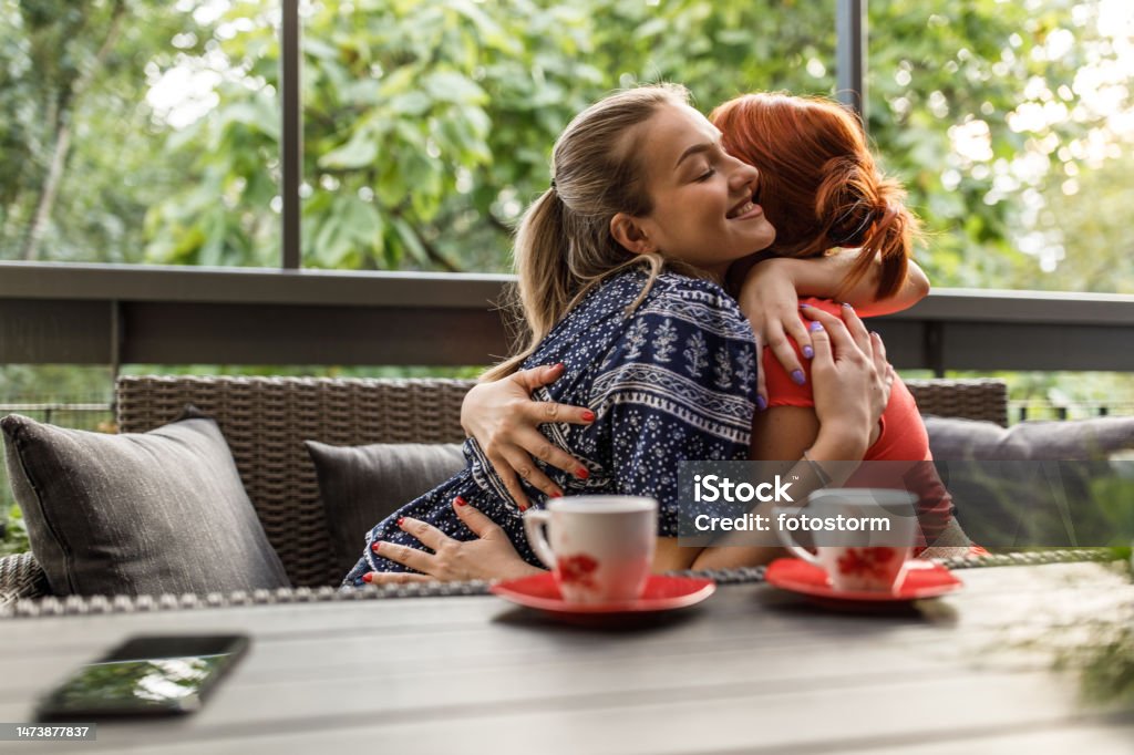 Mother And Daughter Having Bonding Moments And Hugging Each Other Stock