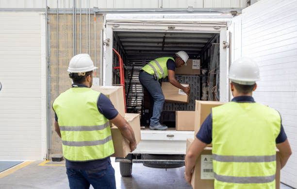 Free Stock Photo of Warehouse worker moving boxes | Download Free ...